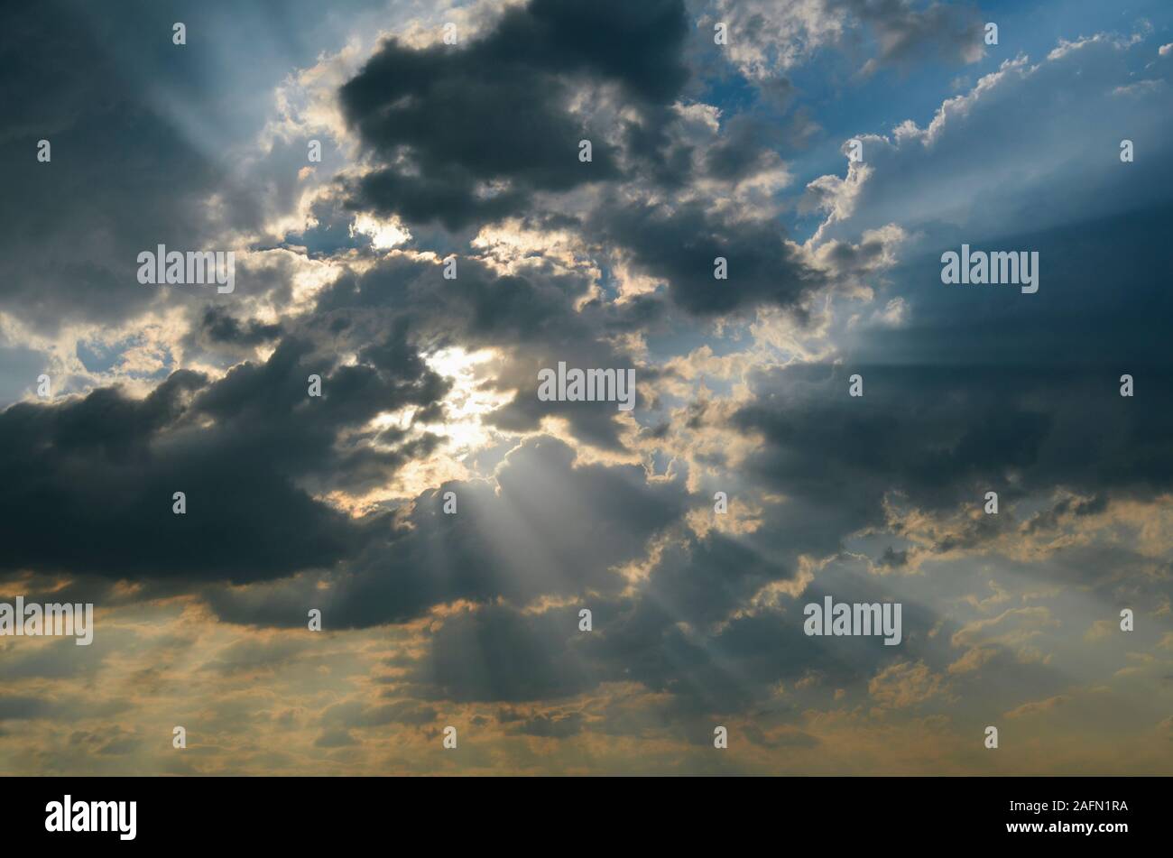 Sunlight passing through clouds hi-res stock photography and images - Alamy