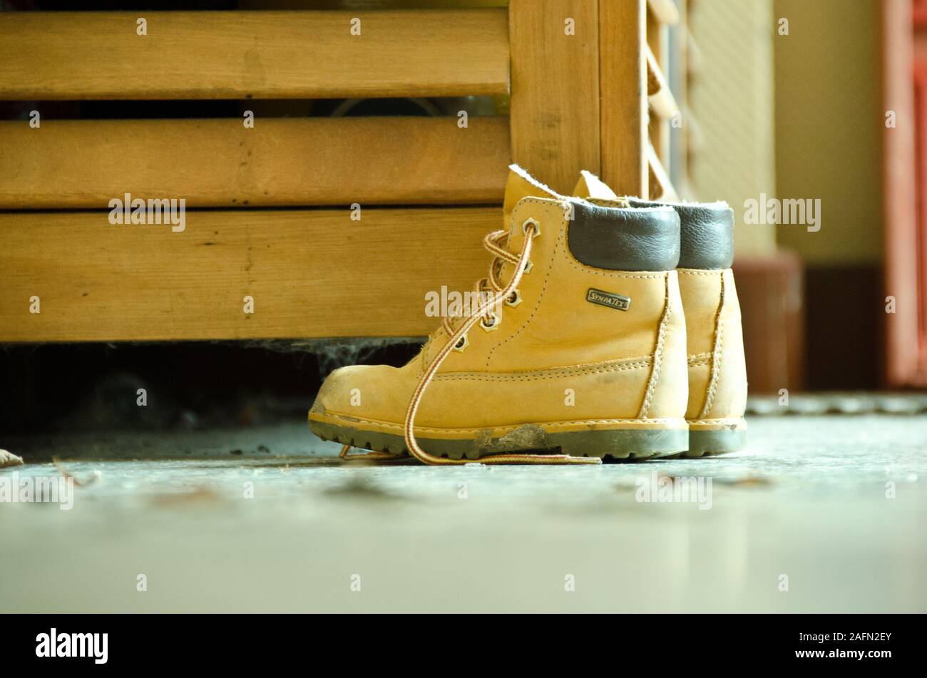 a pair of small tiny shoes for children, at the floor Stock Photo - Alamy