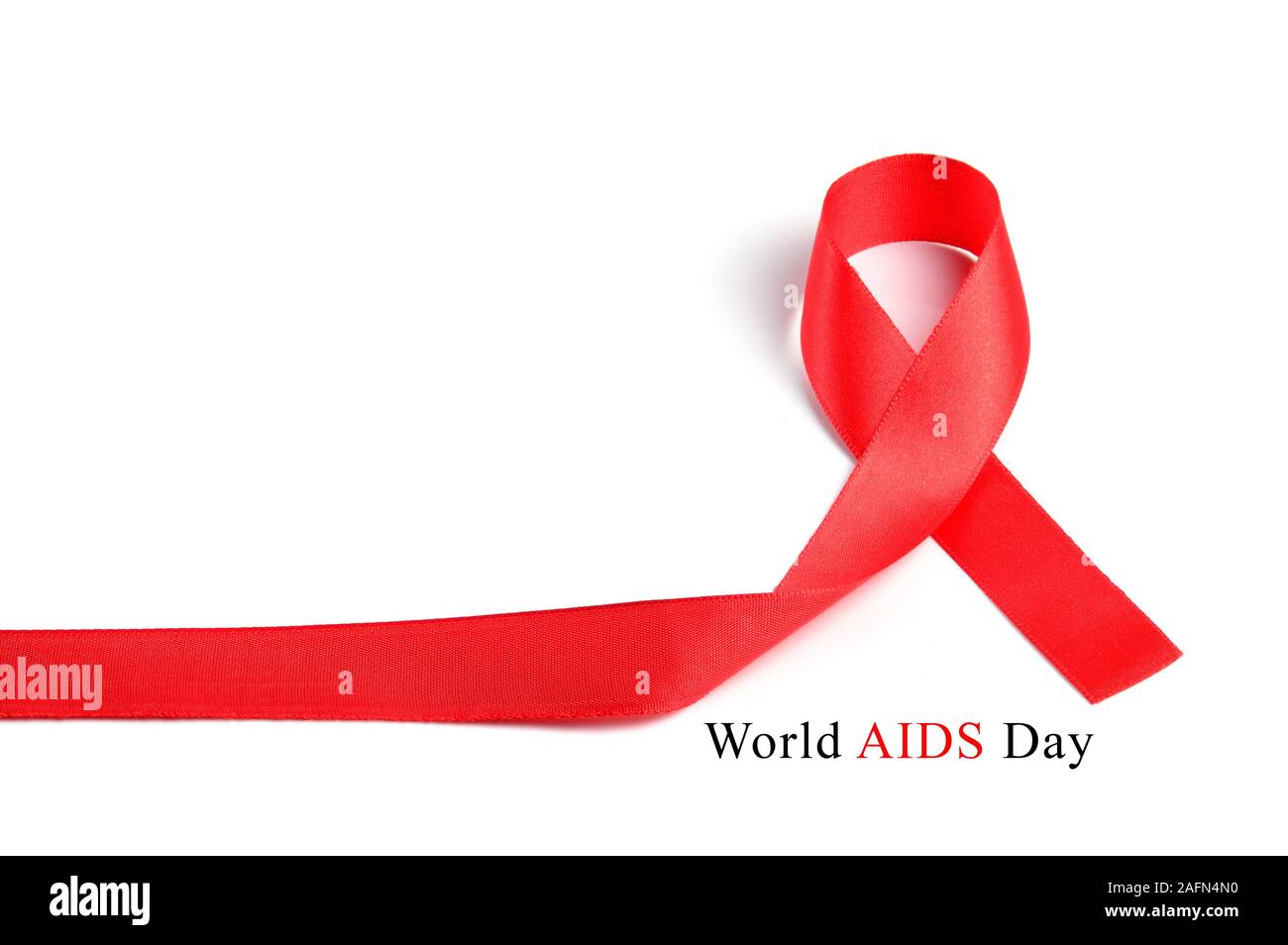 Aids Awareness Red Ribbon on white background Stock Photo - Alamy