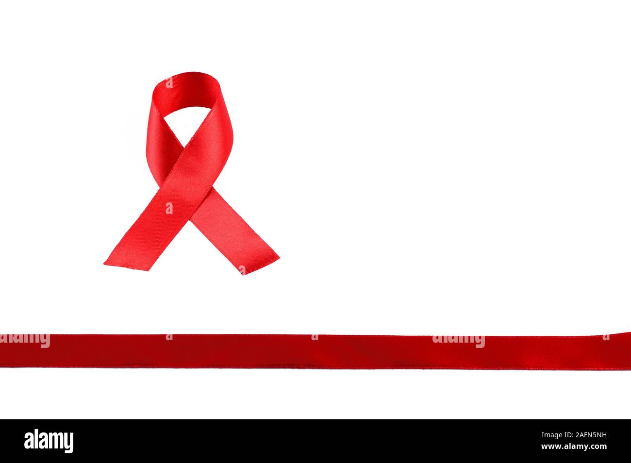 Aids Awareness Red Ribbon on white background Stock Photo - Alamy