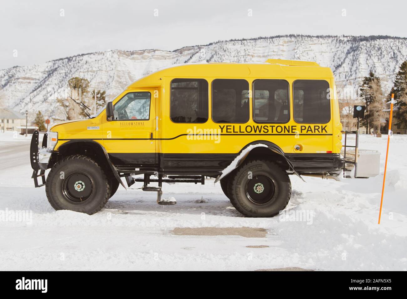 Yellowstone National Park Xanterra snowcoach with wheels parked in ...