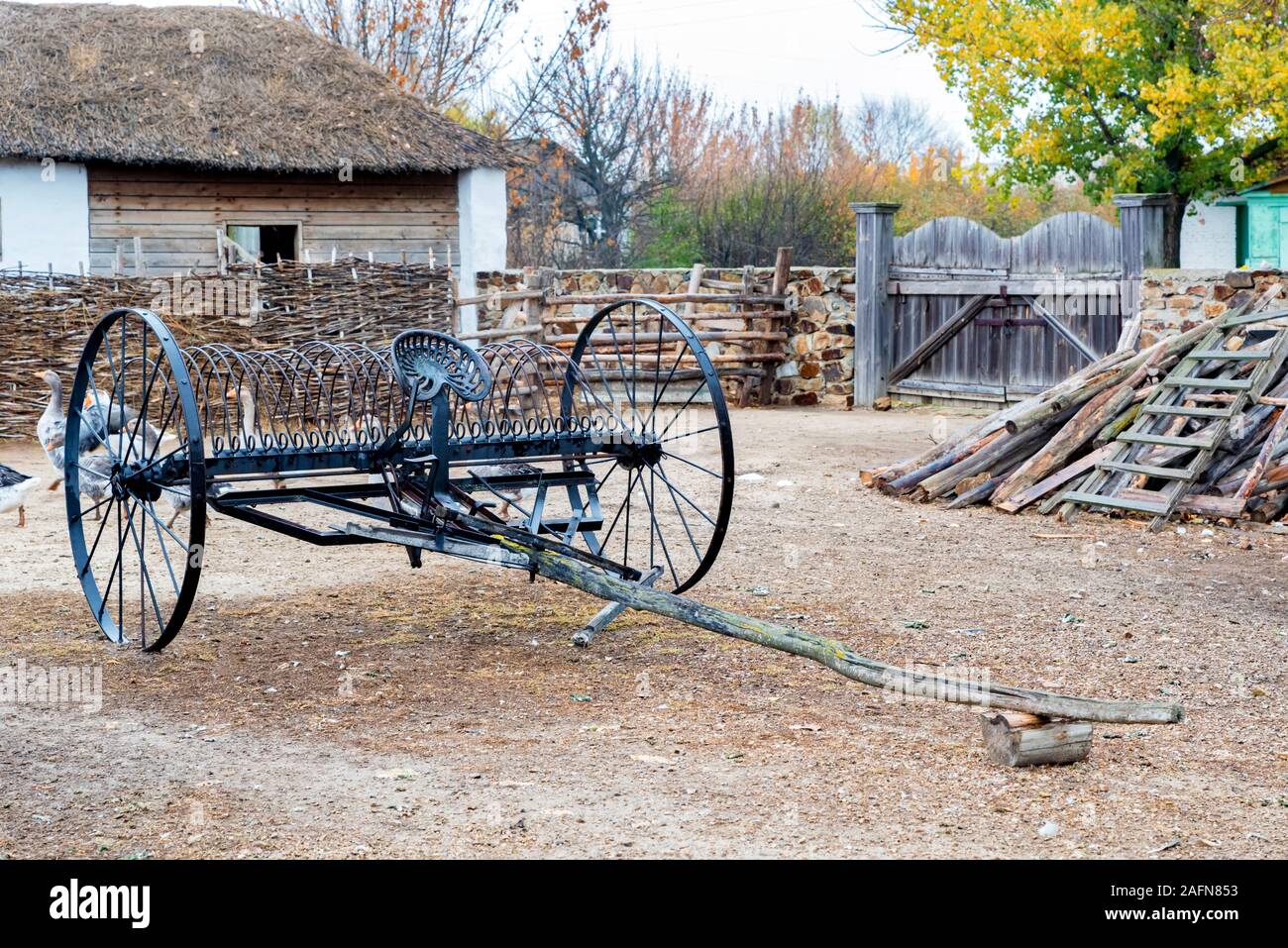 View of old traditional mechanized rake used in farming Stock Photo - Alamy