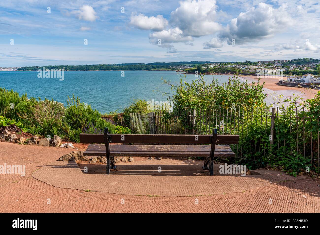 A bench with a view over the Goodrington Sands in Roundham, Torbay ...