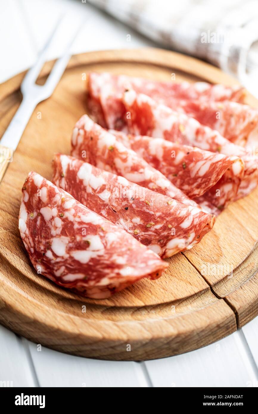 Salami to be sliced hi-res stock photography and images - Alamy