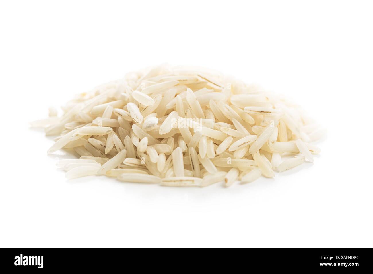 Uncooked indian long rice isolated on white background Stock Photo - Alamy