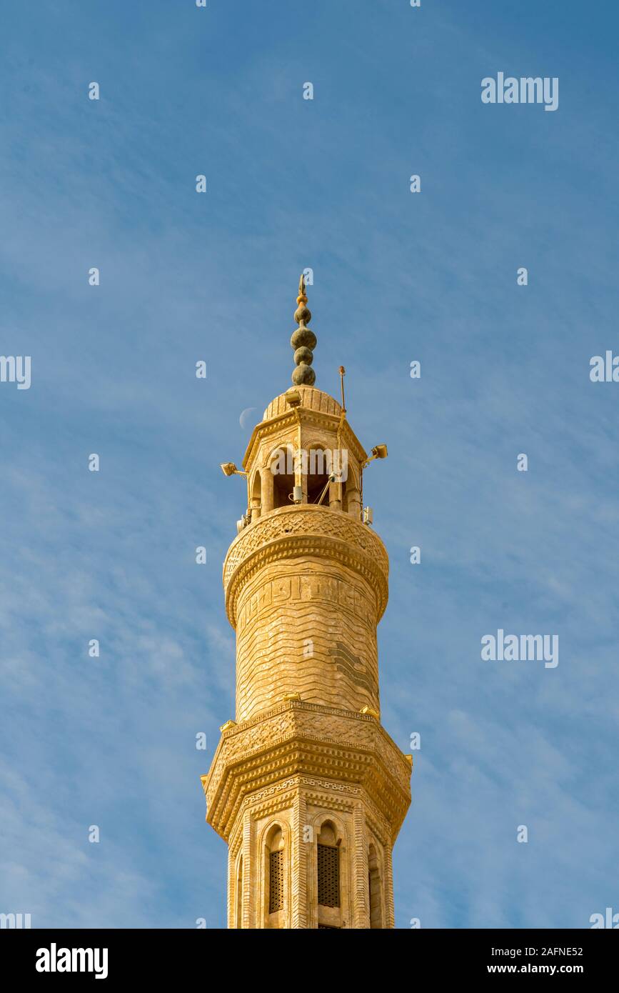 Minaret on a background of blue sky. Islamic faith concept. vertical ...
