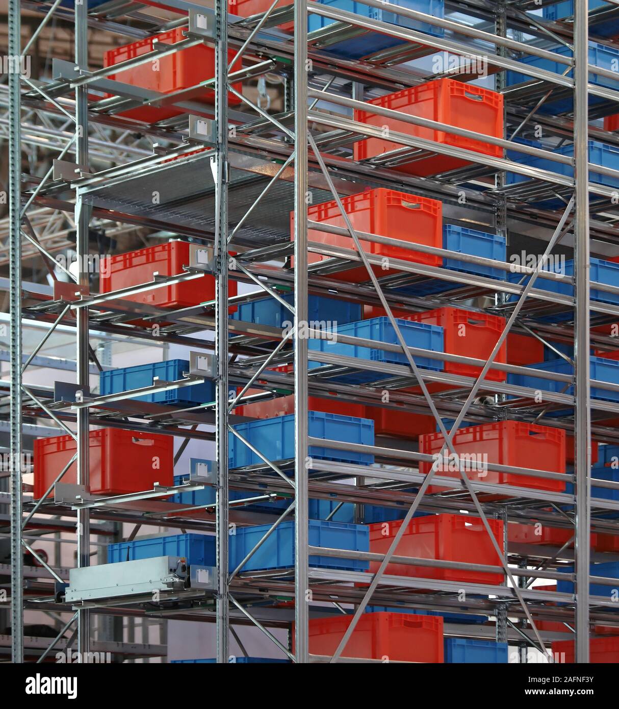 Warehouse Shelving System With Crates and Boxes Stock Photo - Alamy