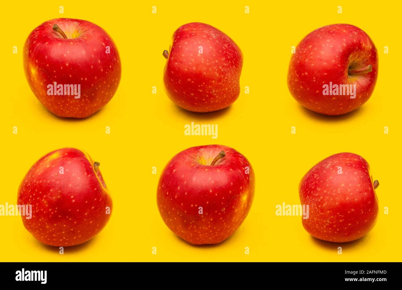 Red apple collage isolated on yellow background, fruit pattern concept ...
