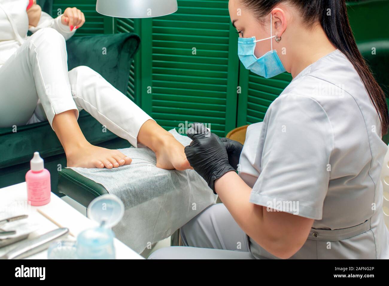 Woman on pedicure procedure receiving foot treatment in spa salon Stock ...