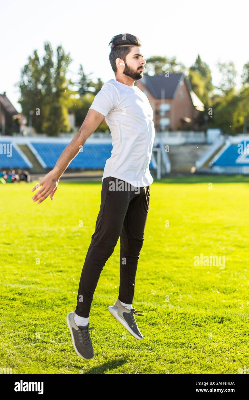 Indian man jumping hi-res stock photography and images - Alamy