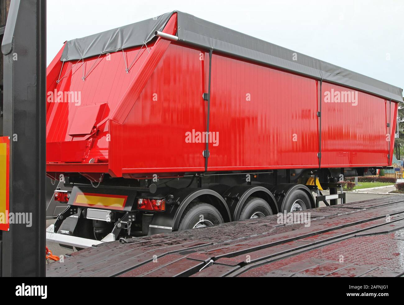 Big Red Semi Trailer For Bulk Cargo Transport Stock Photo - Alamy