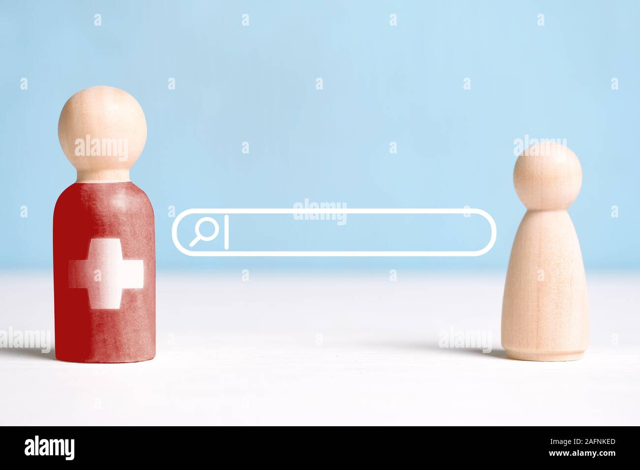 The concept of abstract doctor search on the Internet online. Wooden ...