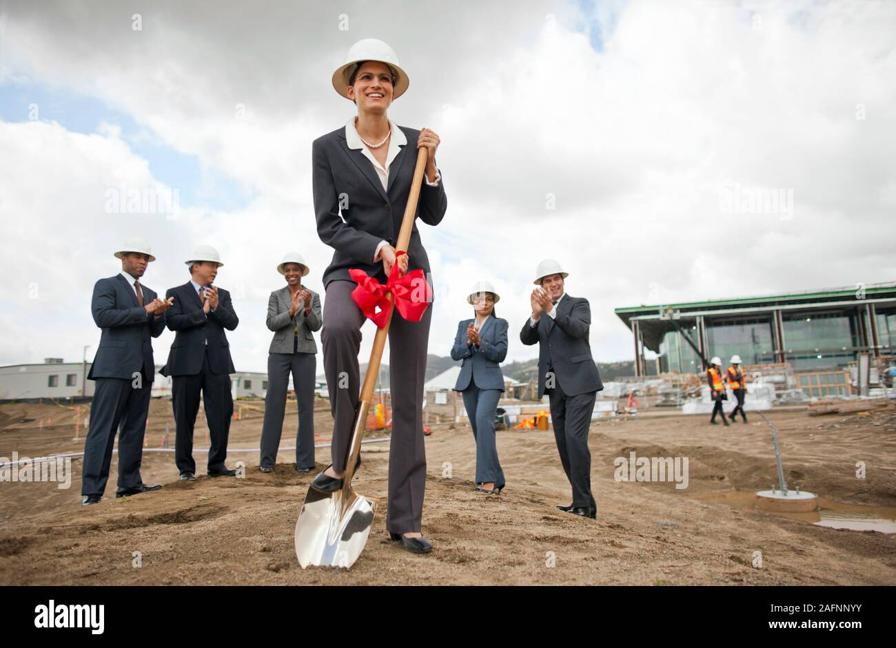 Group of business colleagues breaking ground on a project Stock Photo ...