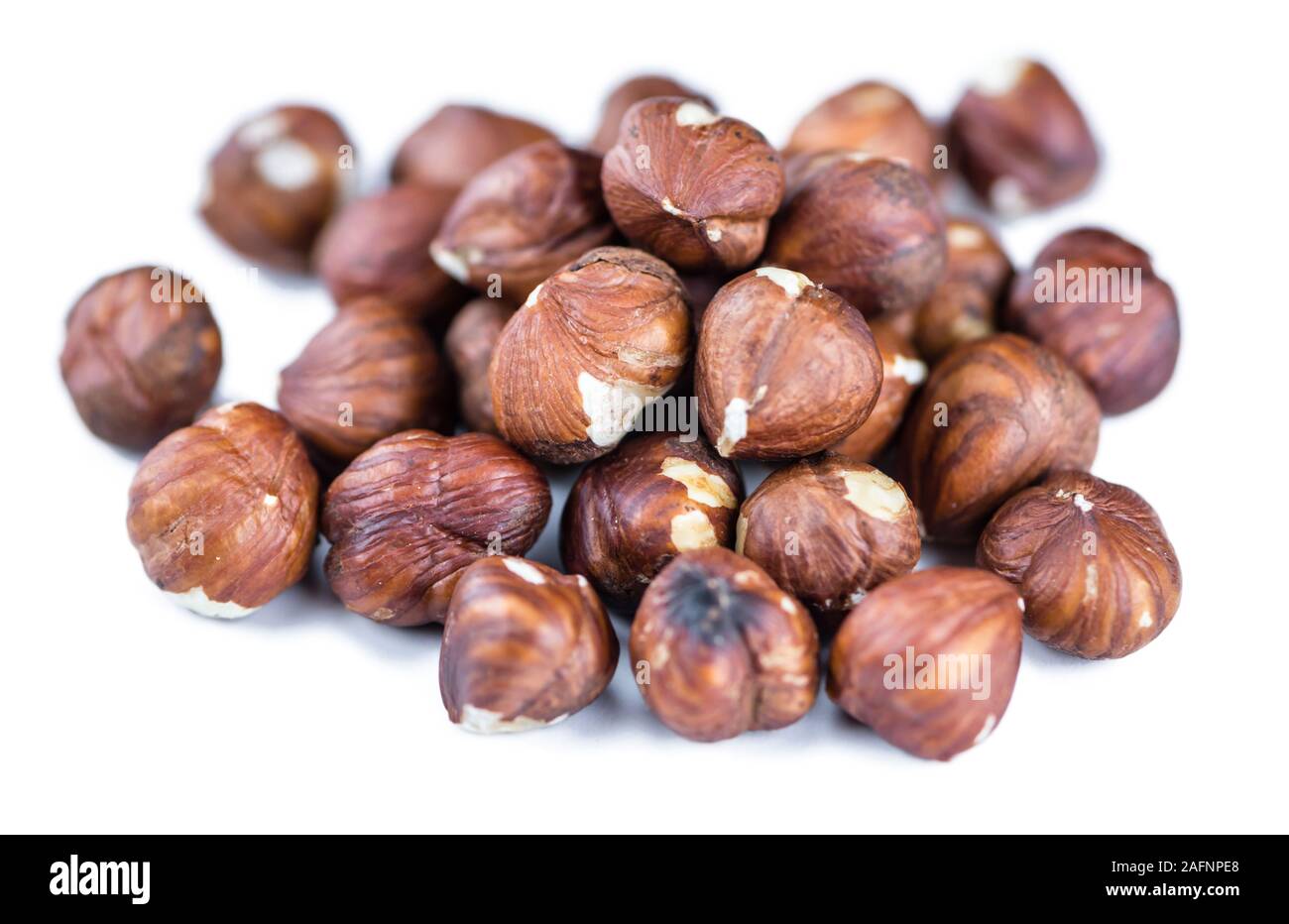 Hazelnuts (detailed close-up shot) isolated on white background Stock ...