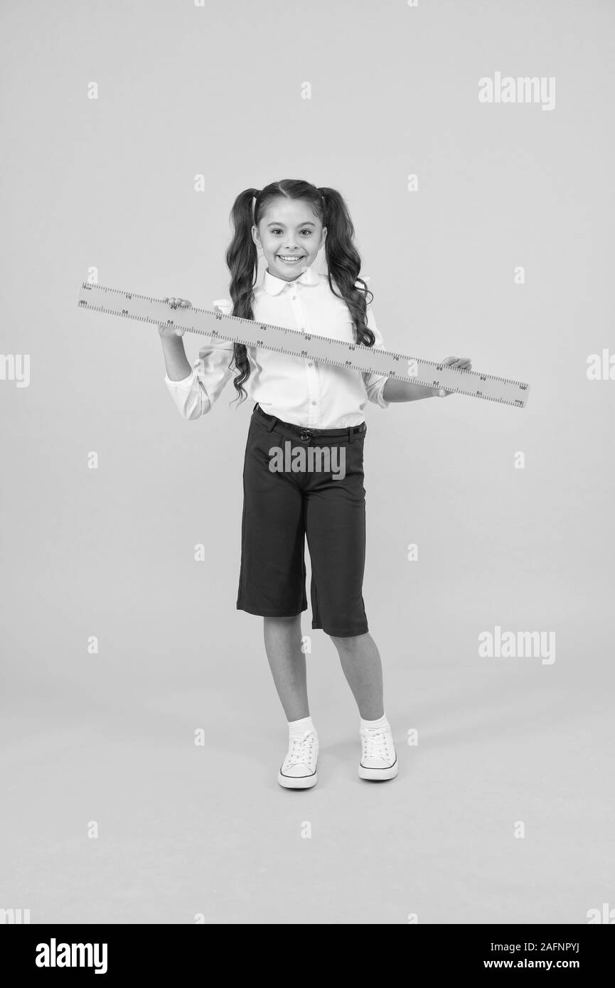 Girl measuring ruler school Black and White Stock Photos & Images - Alamy