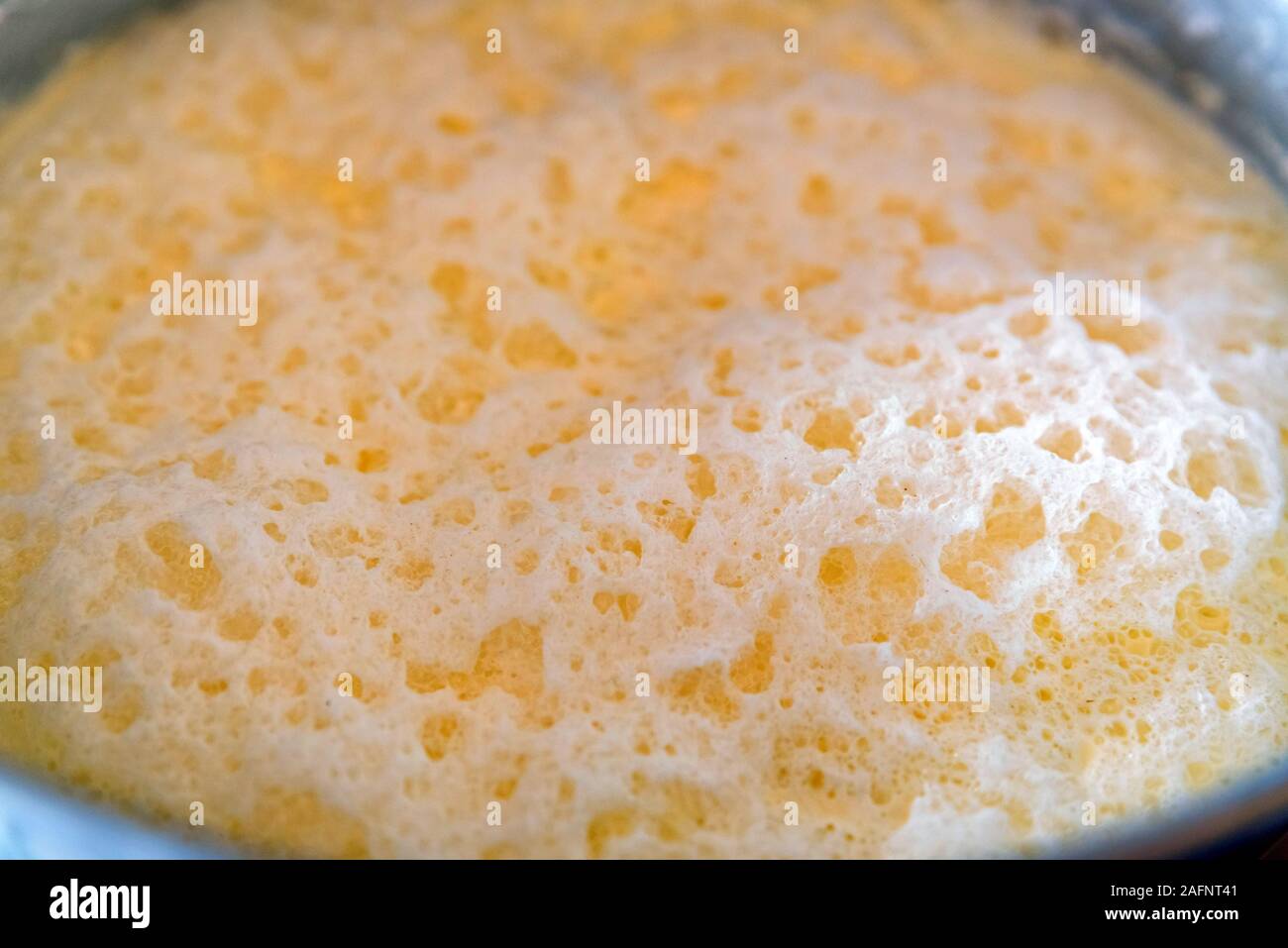 Close texture of fresh milk with foam right after milking Stock Photo ...