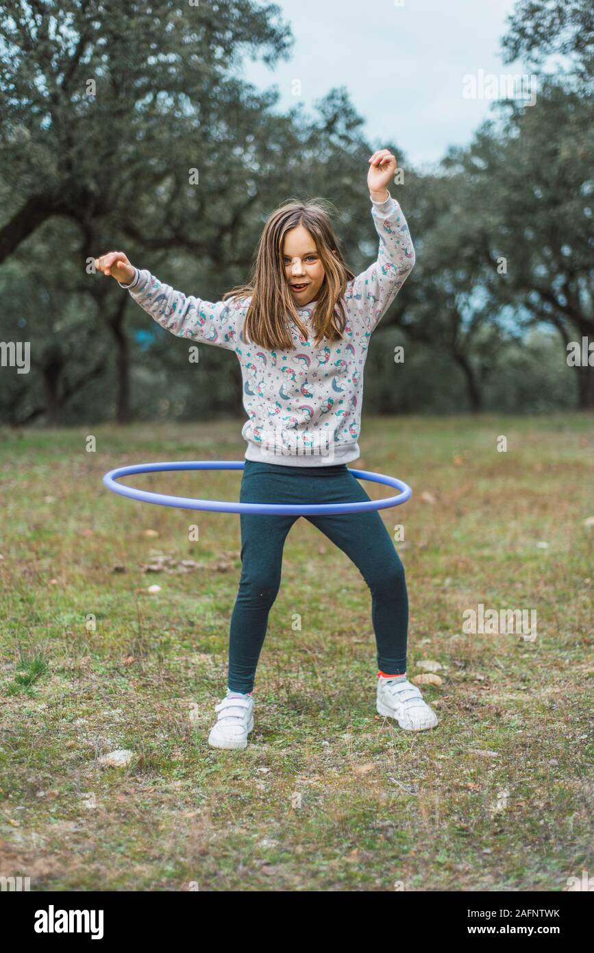 girl in the forest with hula hoop Stock Photo - Alamy