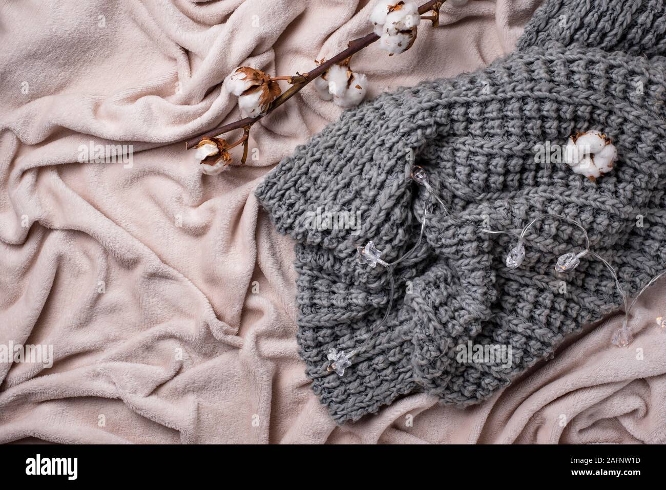 Cotton branch and light blanket Stock Photo - Alamy