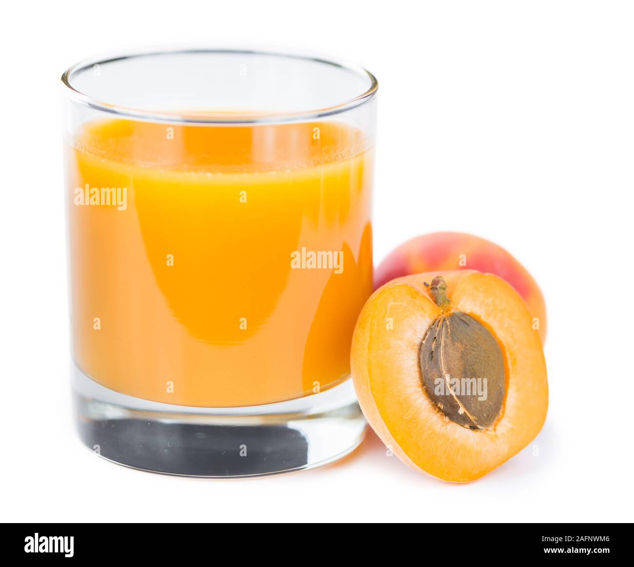 Fresh made Apricot Juice isolated on white background (close-up shot ...