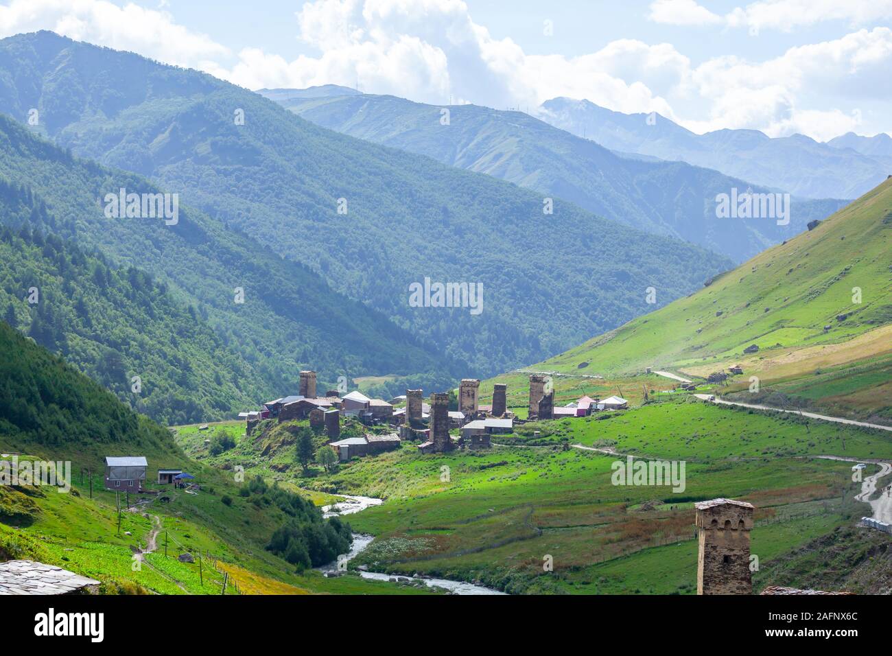 View of the Ushguli village at the foot of Mt. Shkhara. Picturesque and ...