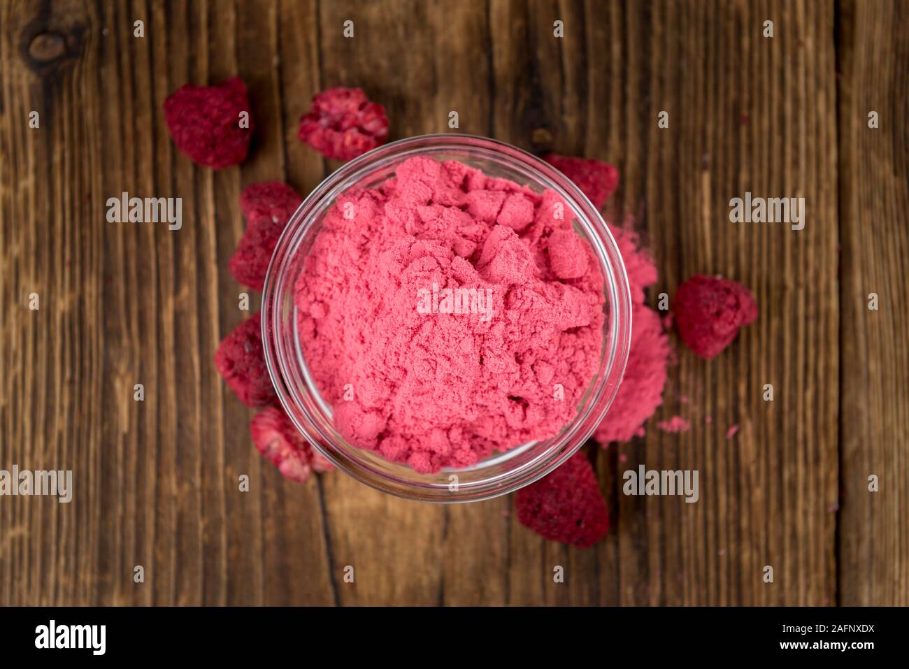 Fresh made Raspberry powder on a vintage background as detailed close ...