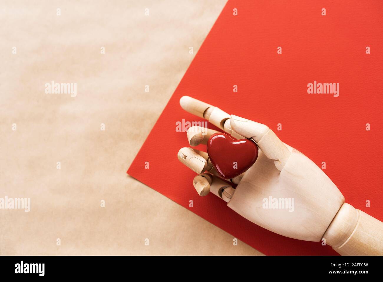 Wooden gift in hand hi-res stock photography and images - Alamy
