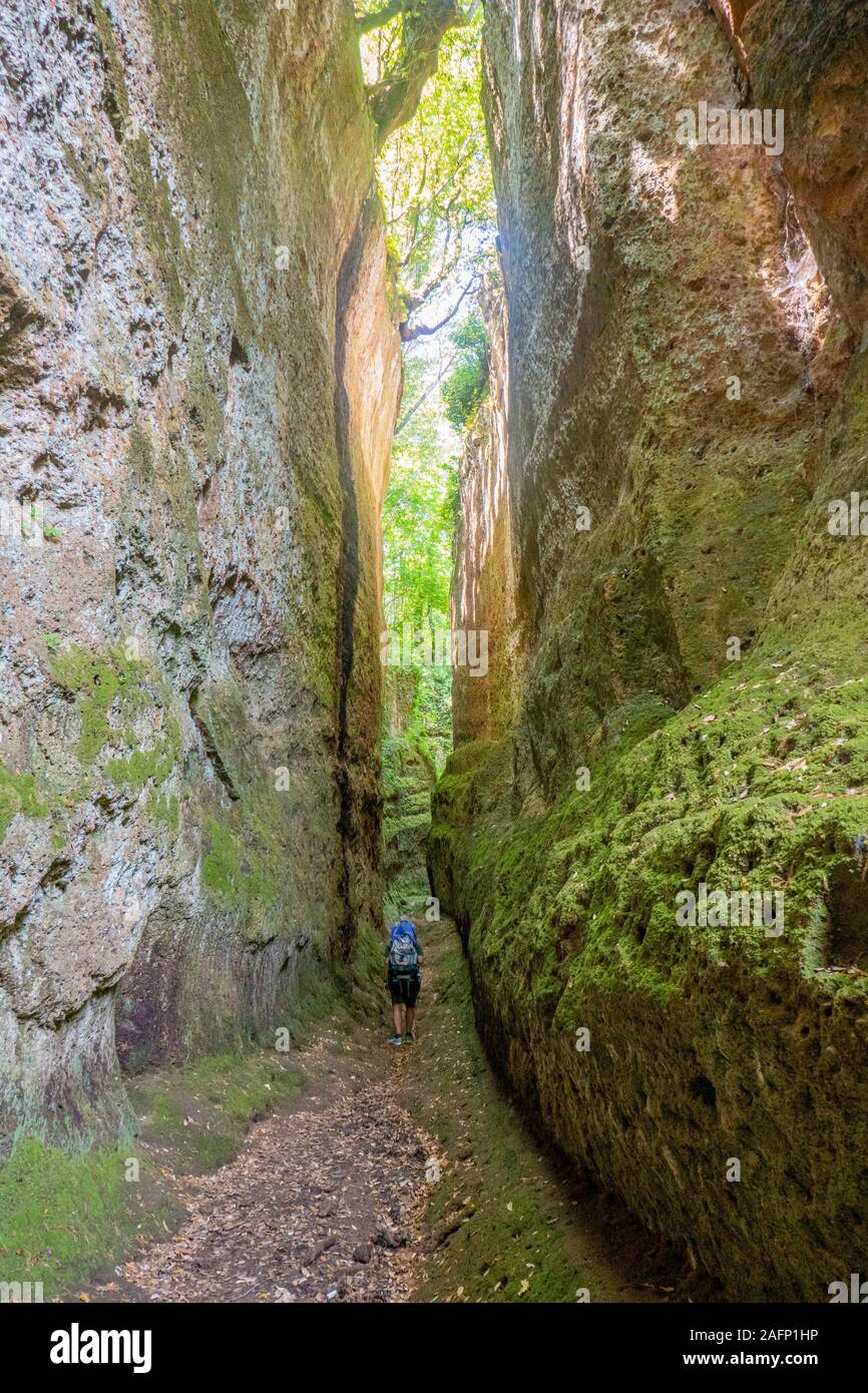 A lonely traveller in ancient path named Vie Cave, Tuscany, Italy Stock ...