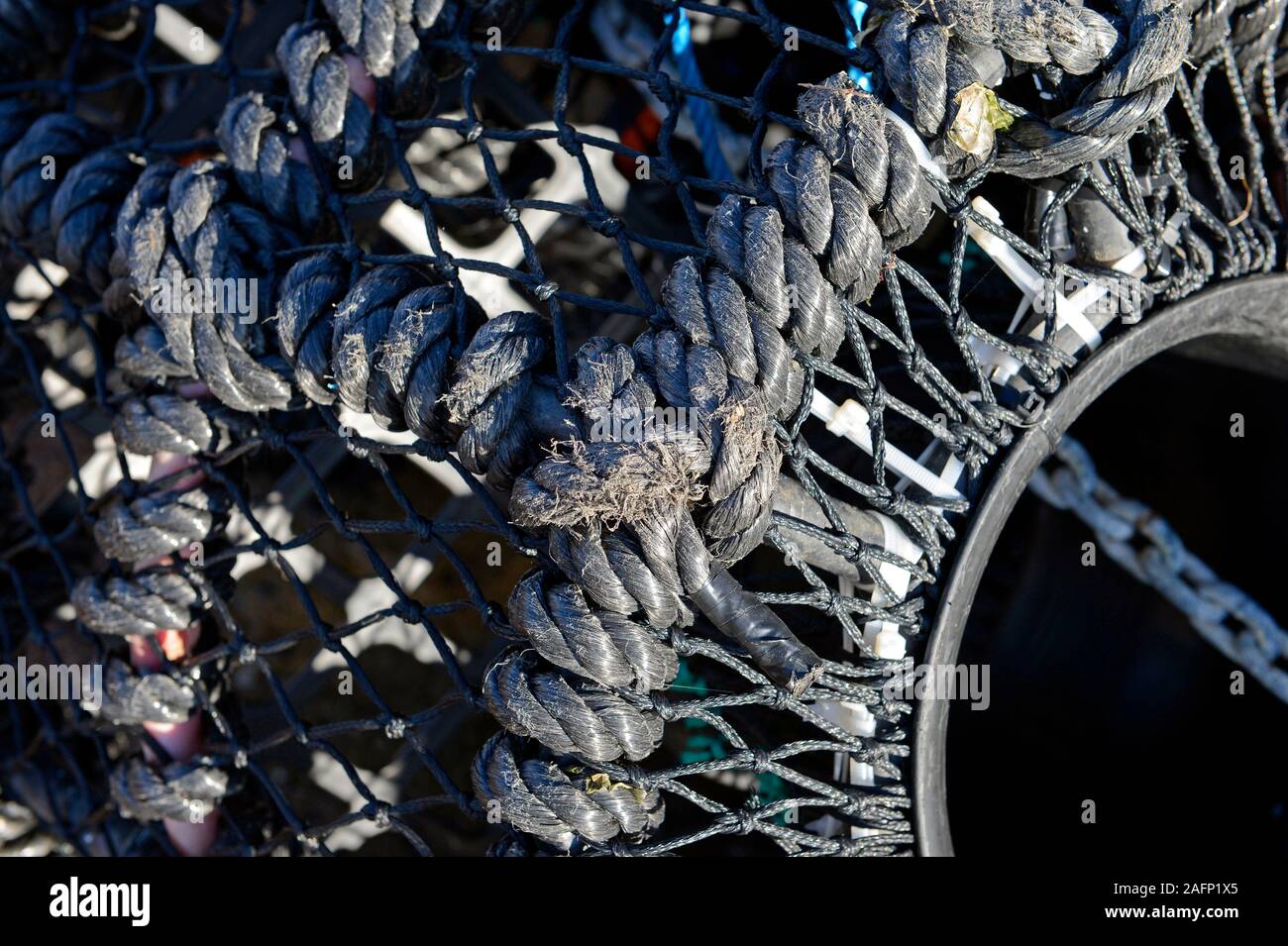 A new crab creel or pot used by inshore fishers on the quayside at ...