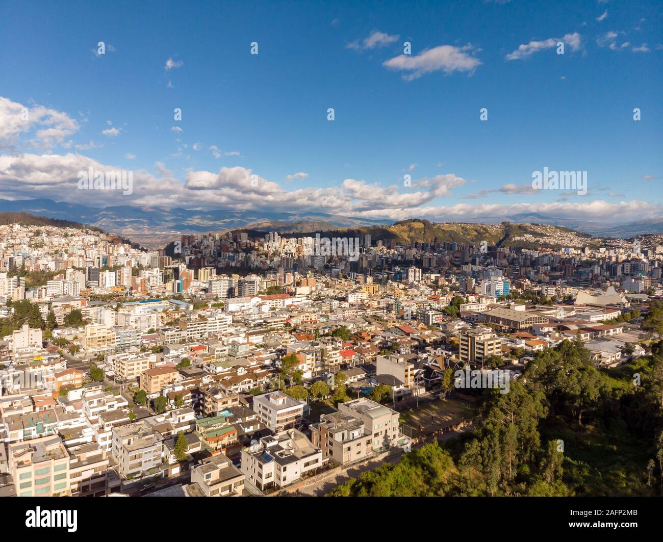 Aerial view of the northern part of the city of Quito with its blue sky ...