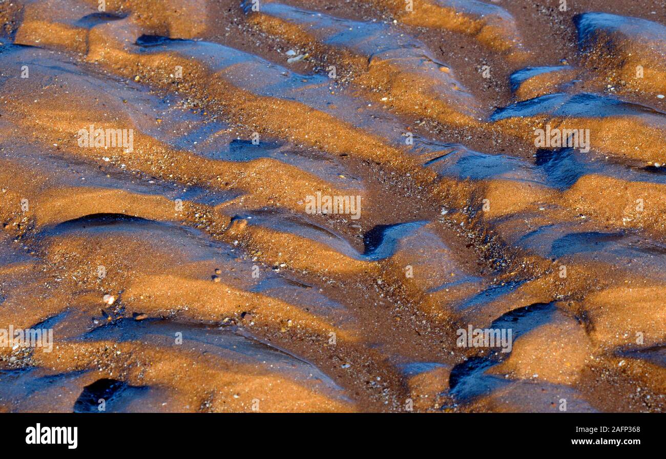 Sand patterns left on the beach at Goodrington Sands in Paignton in ...