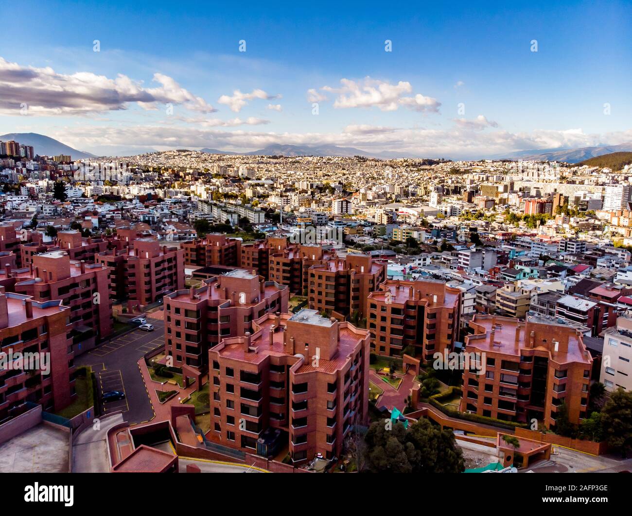 Aerial view of the northern part of the city of Quito with its blue sky ...