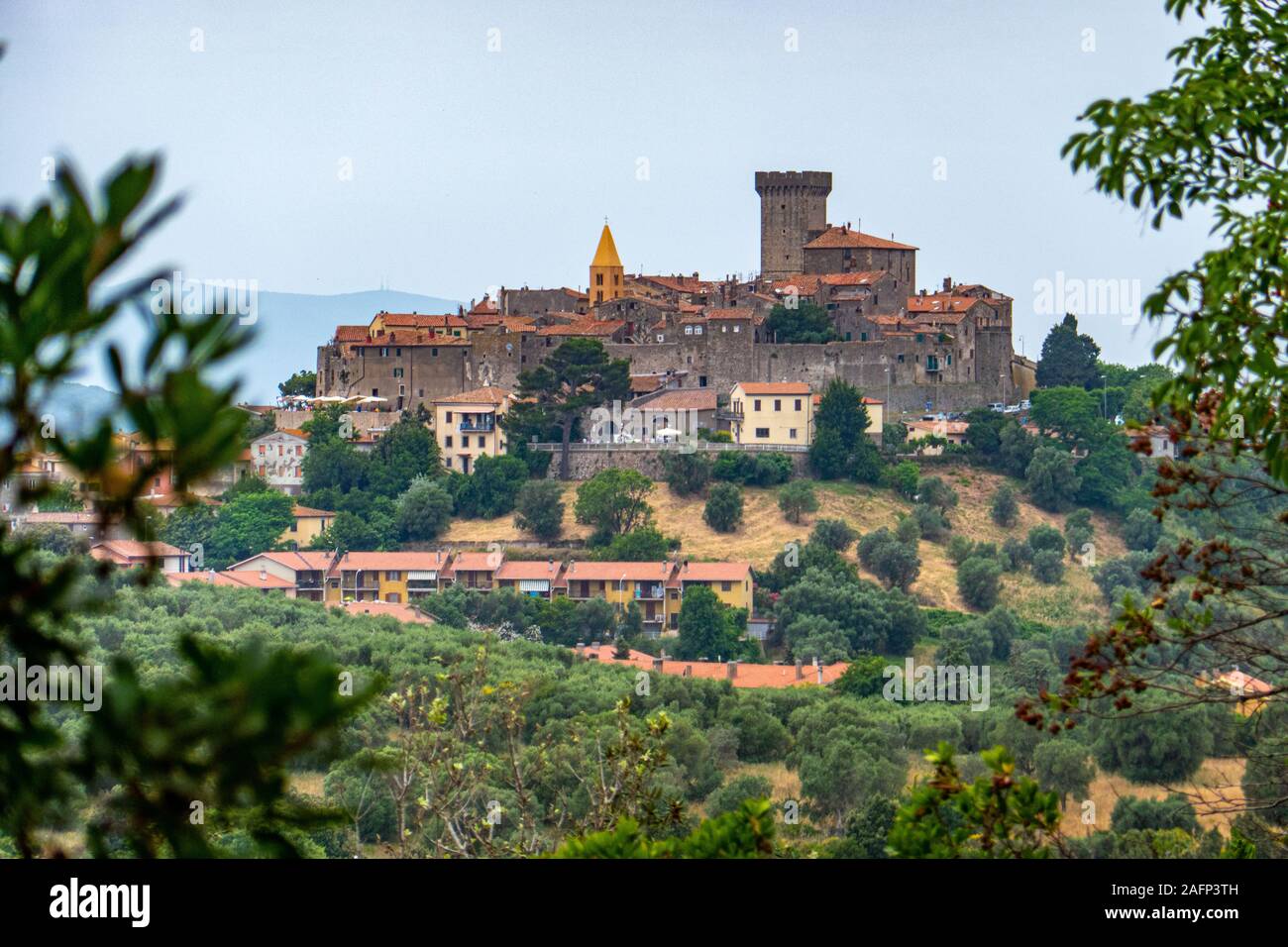 Little city of Capalbio in Tuscany with the tower and plants around ...
