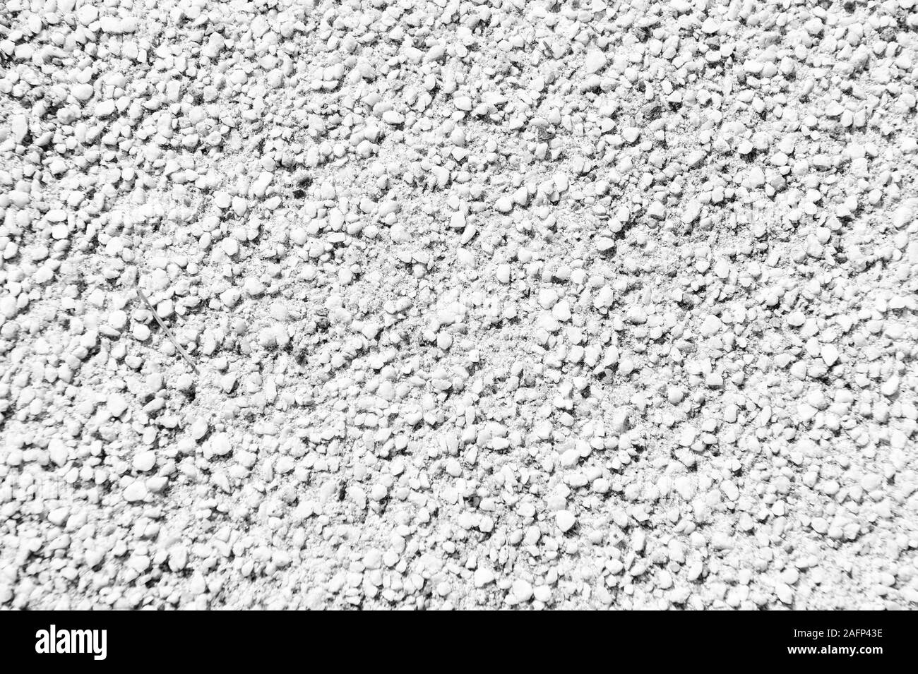 Rough and uneven. Sand and stone surface. Sandy stone texture. Gravel ...