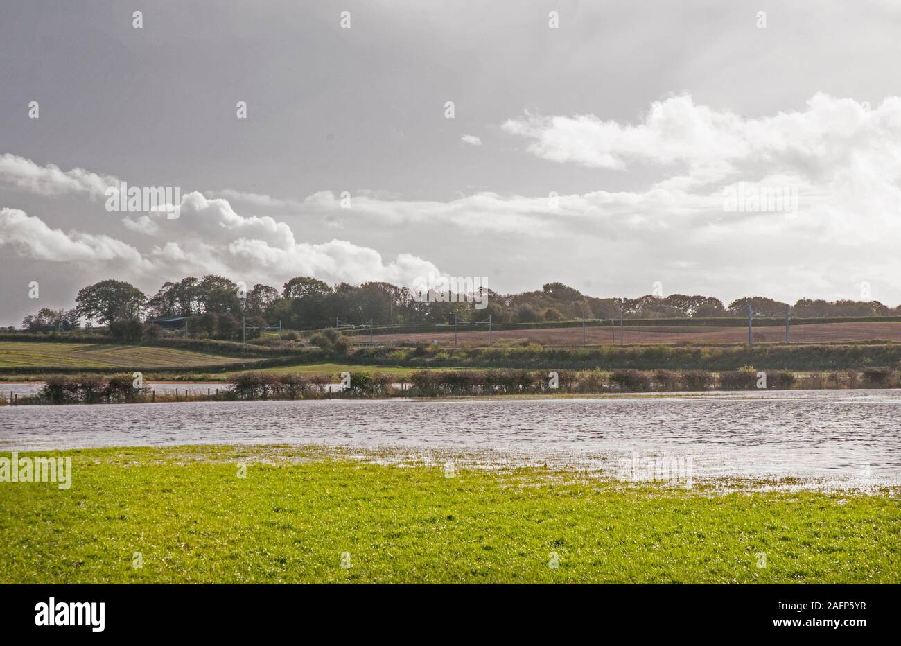 Flooded farm fields due to heavy rainfall and overflowing dykes and ...