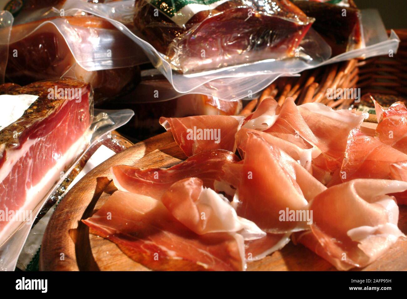 Italian food products slices of smoked pork meat Speck Stock Photo - Alamy