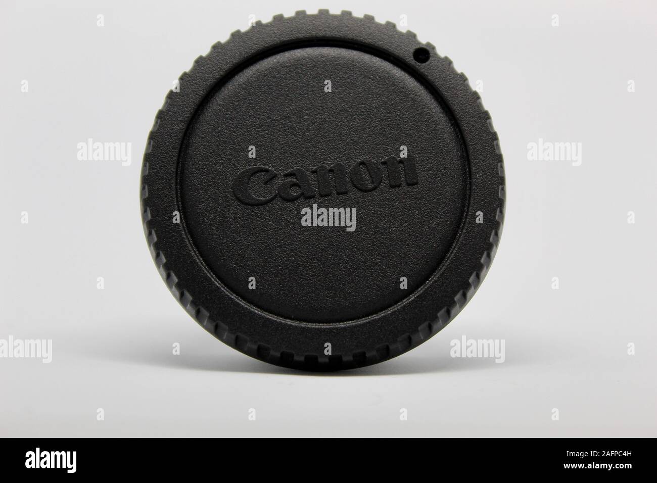 Black Canon Camera Lens Cap on White Background Stock Photo - Alamy