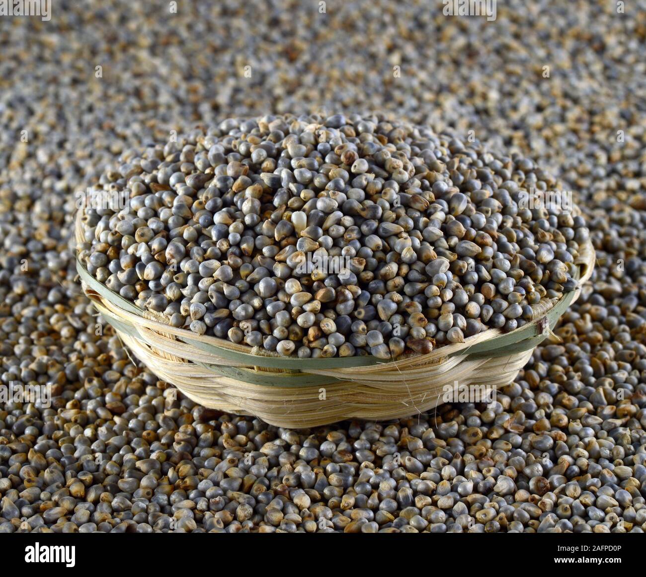 Bajra (Pearl millet) in wooden (bamboo) basket Stock Photo - Alamy