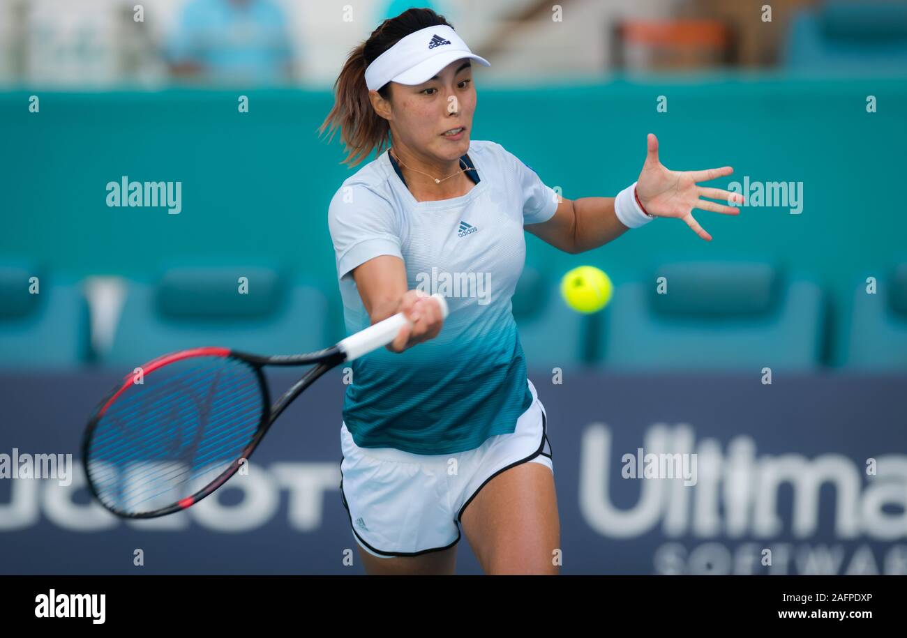 Qiang Wang of China in action during her quarter-final match at the 2019 Miami Open WTA Premier ...