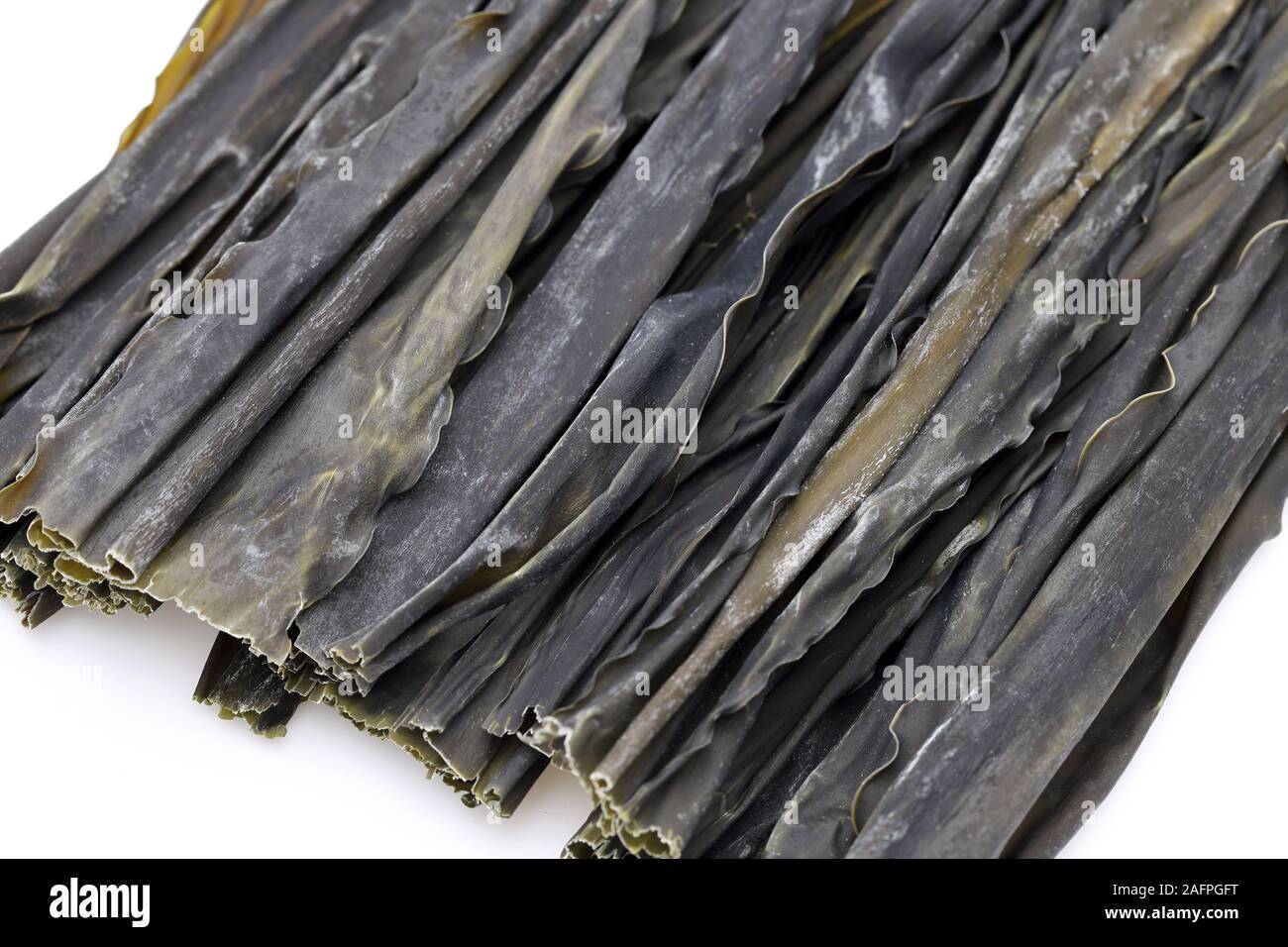 Japanese food konbu kelp on white background Stock Photo - Alamy