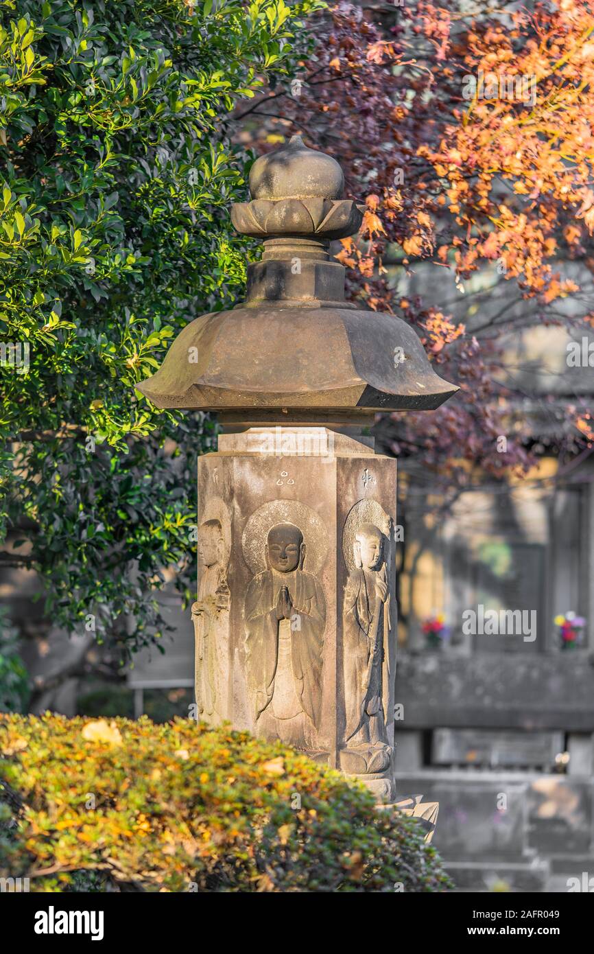Six Jizo statues on an hexagonal memorial stone stand where is engraved ...
