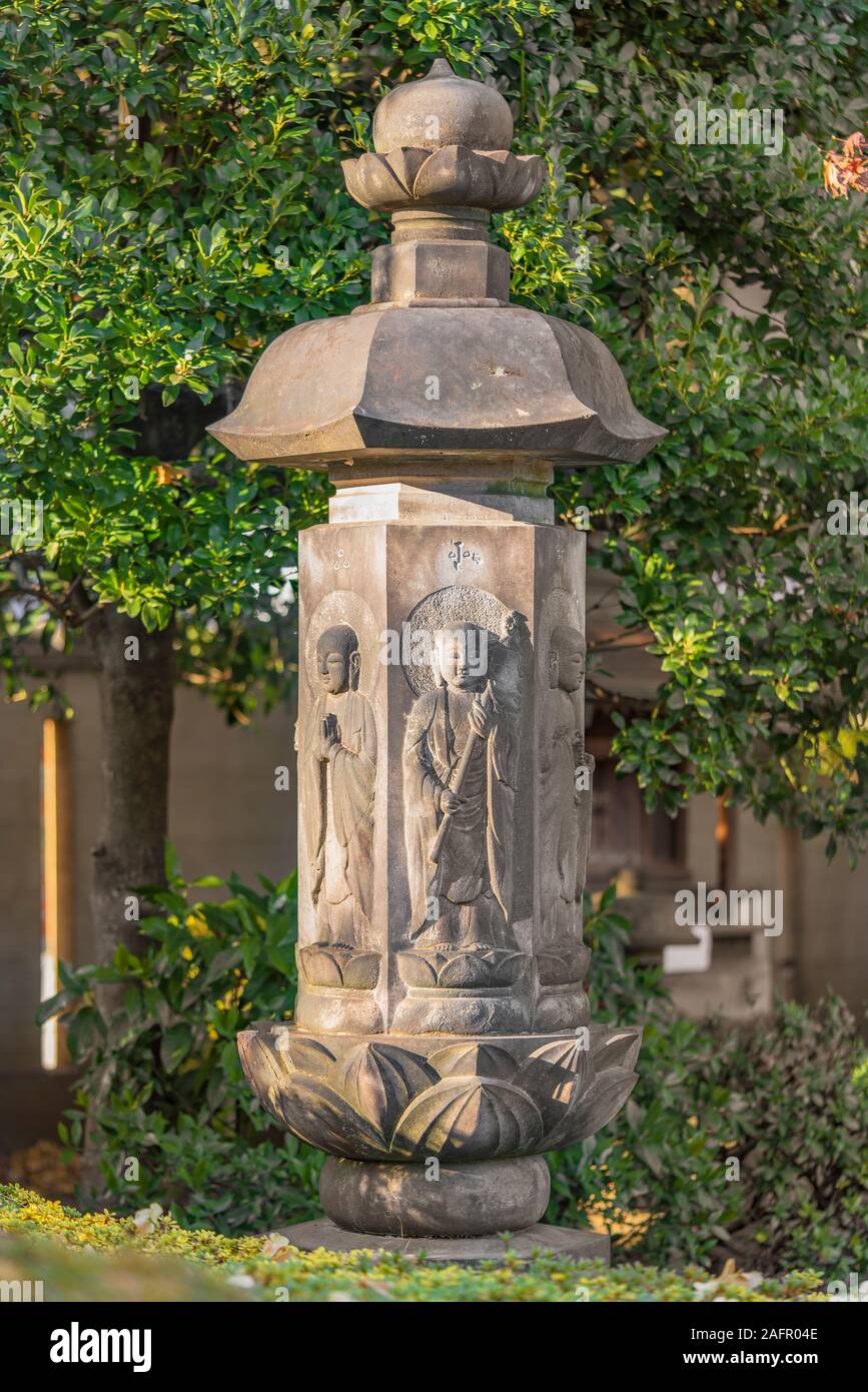 Six Jizo statues on an hexagonal memorial stone stand where is engraved ...