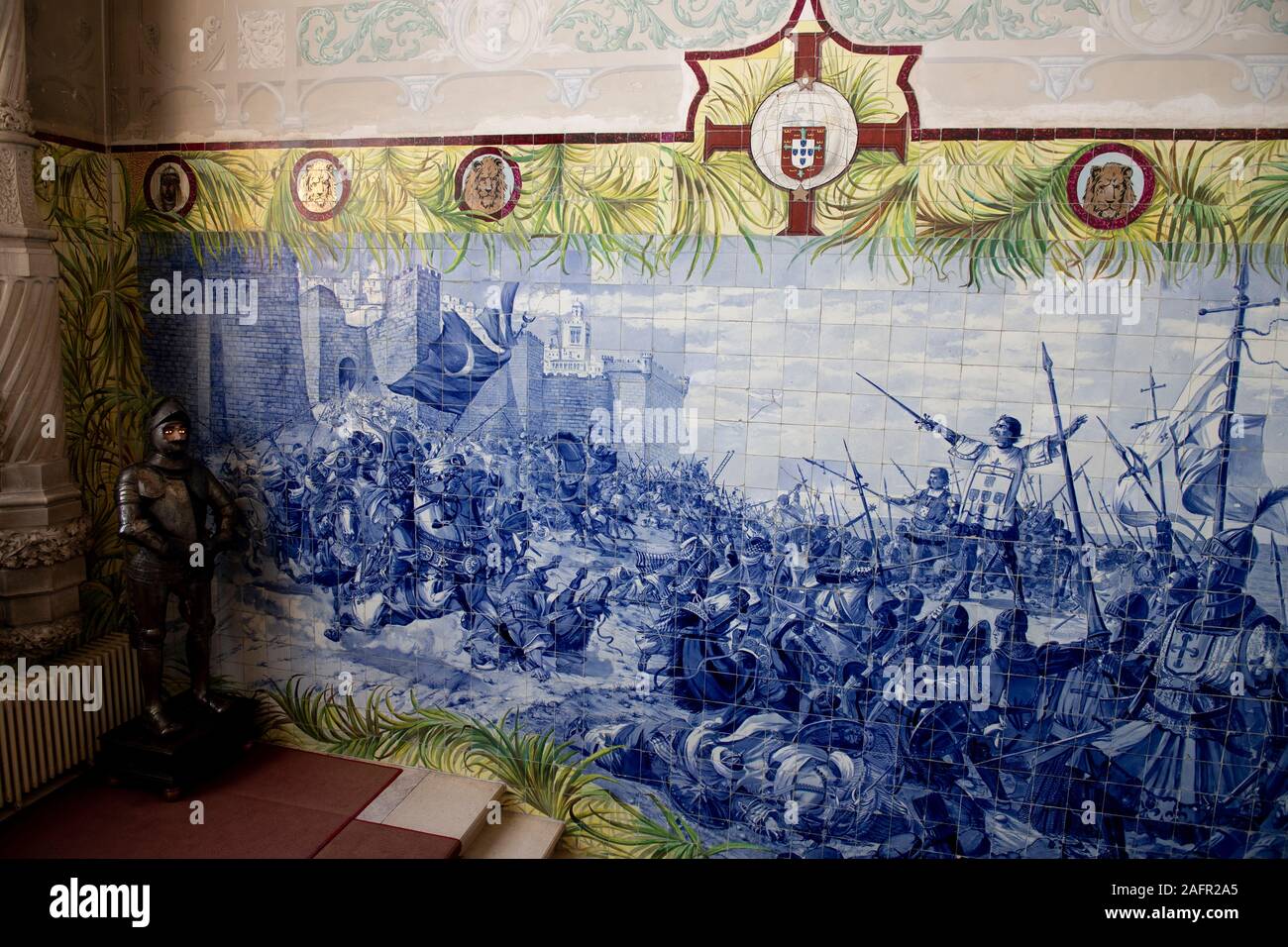 Azulejo tiles depicting battle scene and suit of armor statue inside ...
