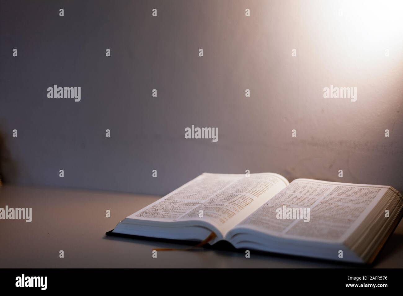 Devotion in room Stock Photo - Alamy