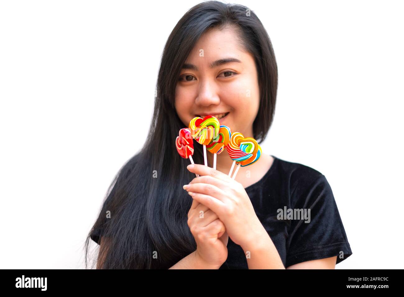 Hand full of sweets hi-res stock photography and images - Alamy