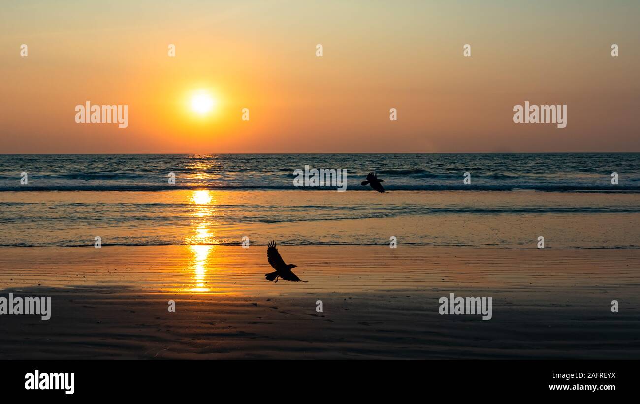 Sunset on Goa India Stock Photo - Alamy