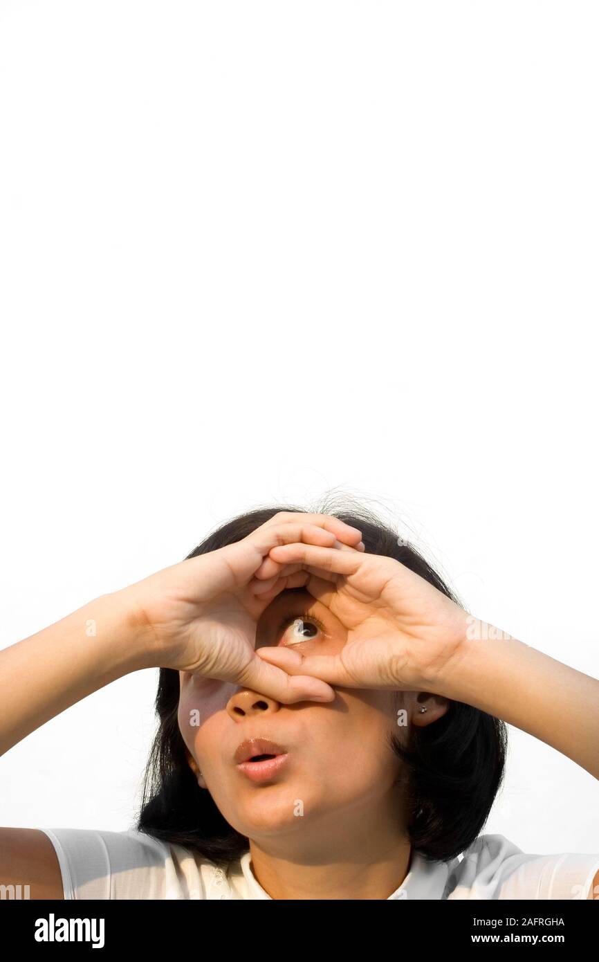 Concept Portrait of Asian Young Woman Acting As An Observer, Looking Up ...