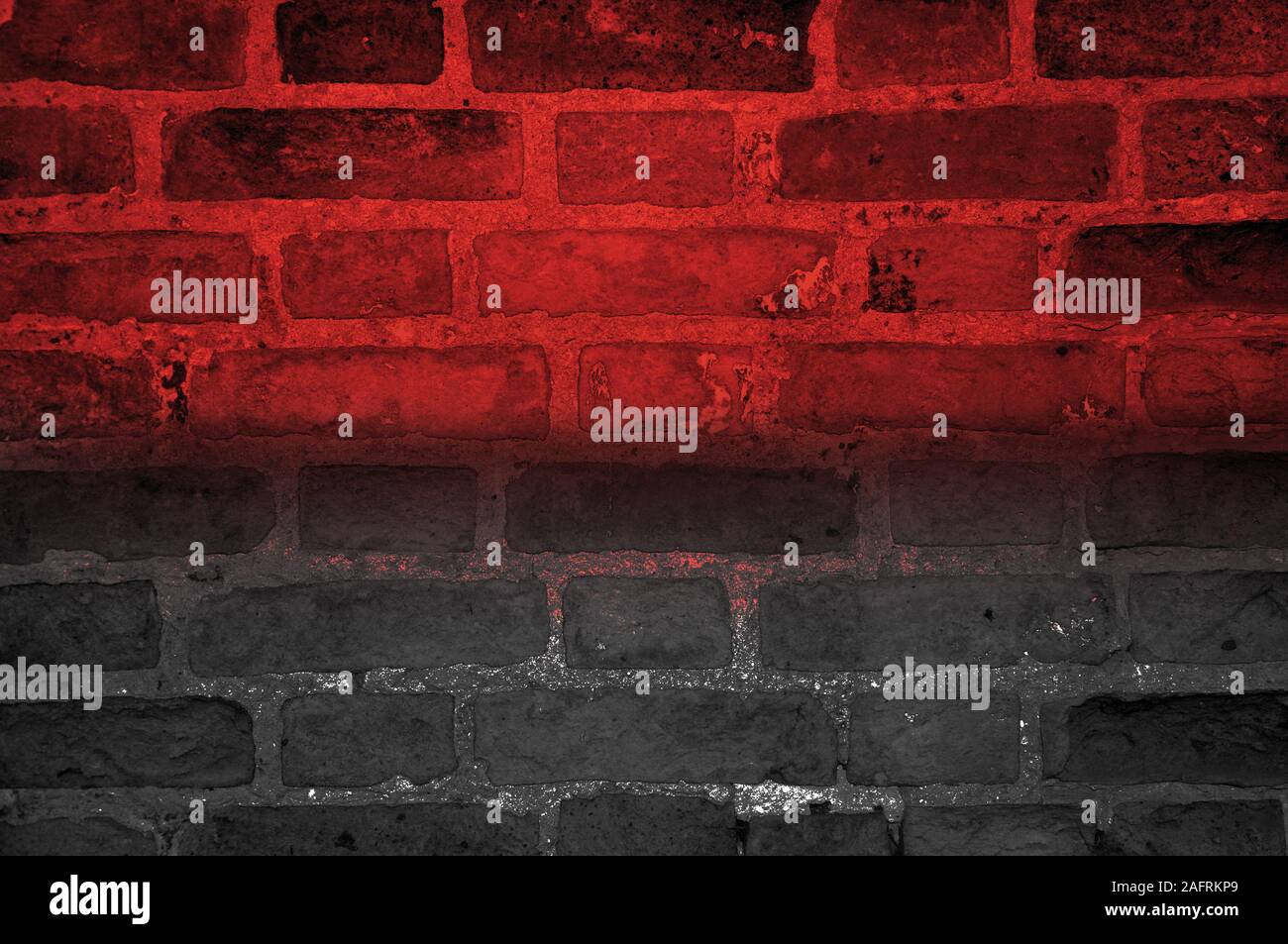 The flag of the right sector of Ukraine painted on a brick wall with an ...