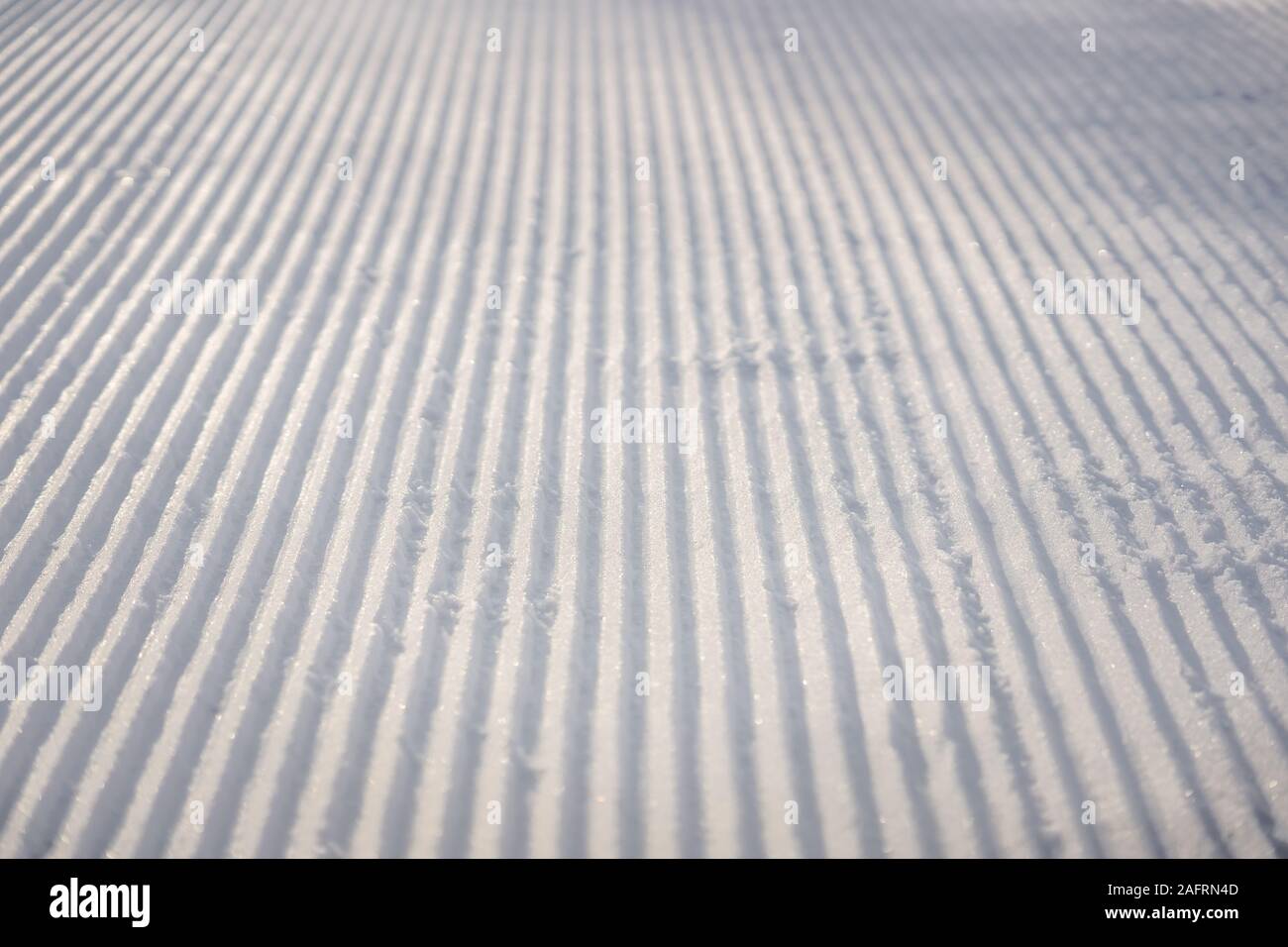 Perfectly groomed piste snow hi-res stock photography and images - Alamy