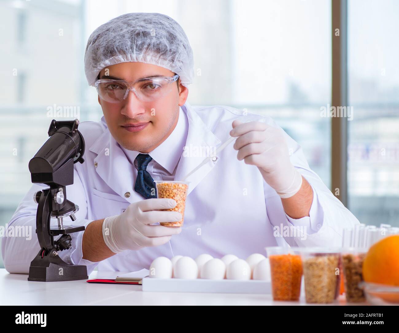 The nutrition expert testing food products in lab Stock Photo - Alamy