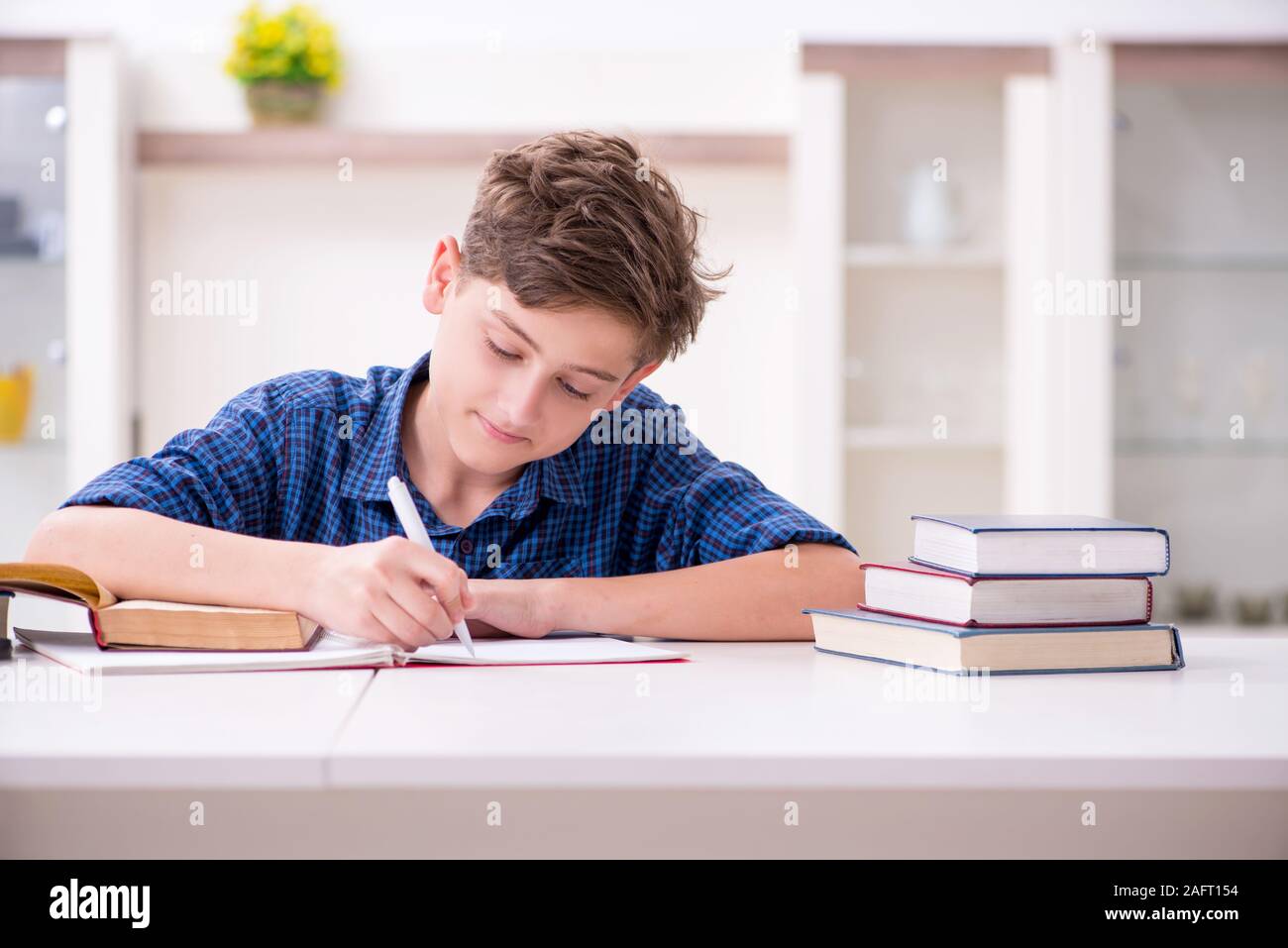 The kid preparing for school at home Stock Photo - Alamy